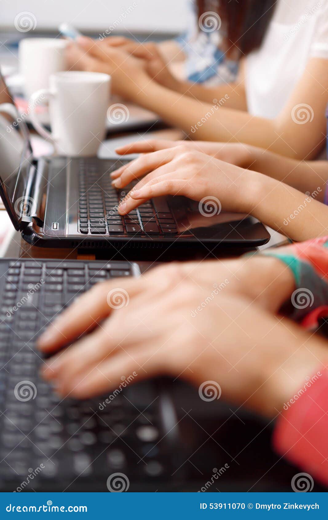 Hands of Two Persons Typing on a Laptop Stock Photo - Image of table ...