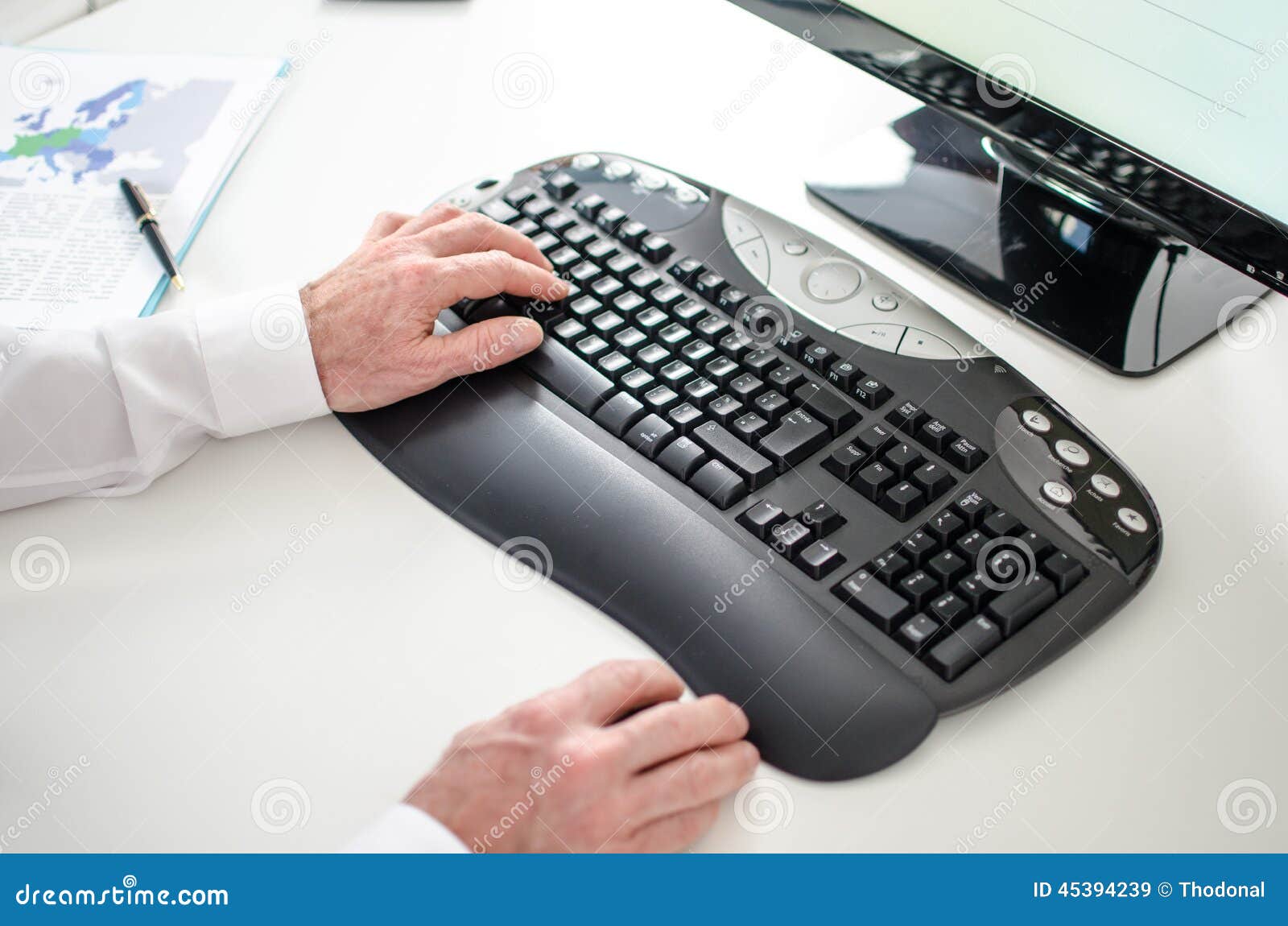 Hands Typing on a Keyboard and Using a Computer Mouse Stock Image ...