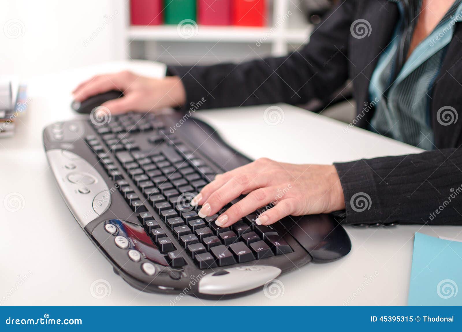 Hands Typing on a Keyboard and Using a Computer Mouse Stock Image ...