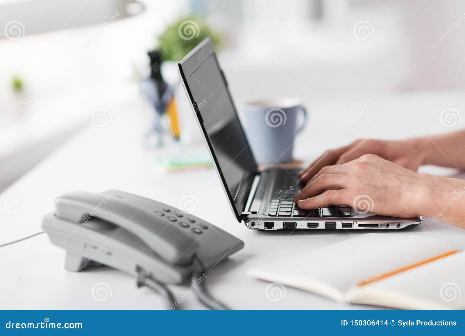 Hands Typing on Laptop and Desk Set on Table Stock Photo - Image of ...