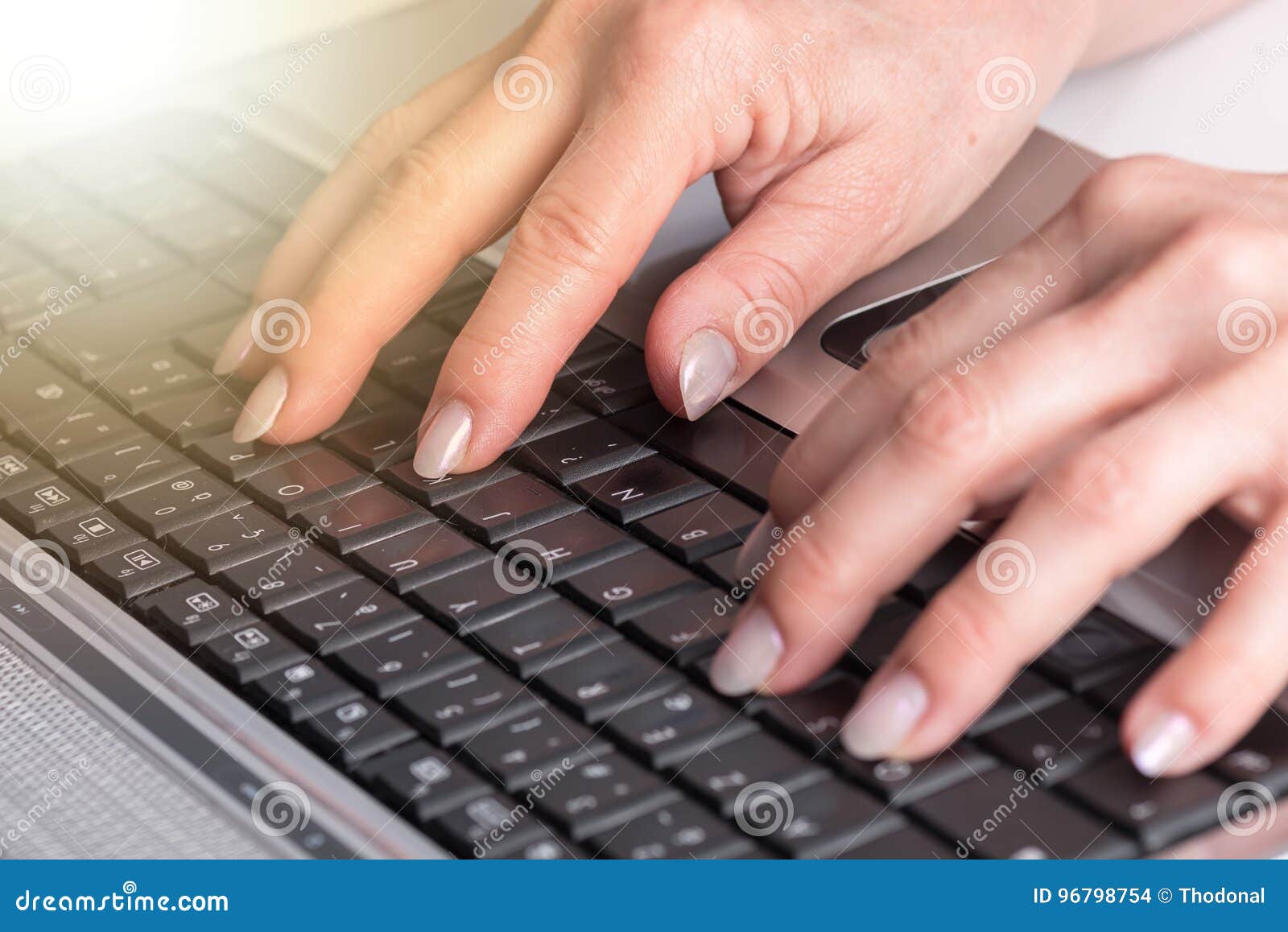 Hands Typing on a Laptop Keyboard, Light Effect Stock Photo - Image of ...