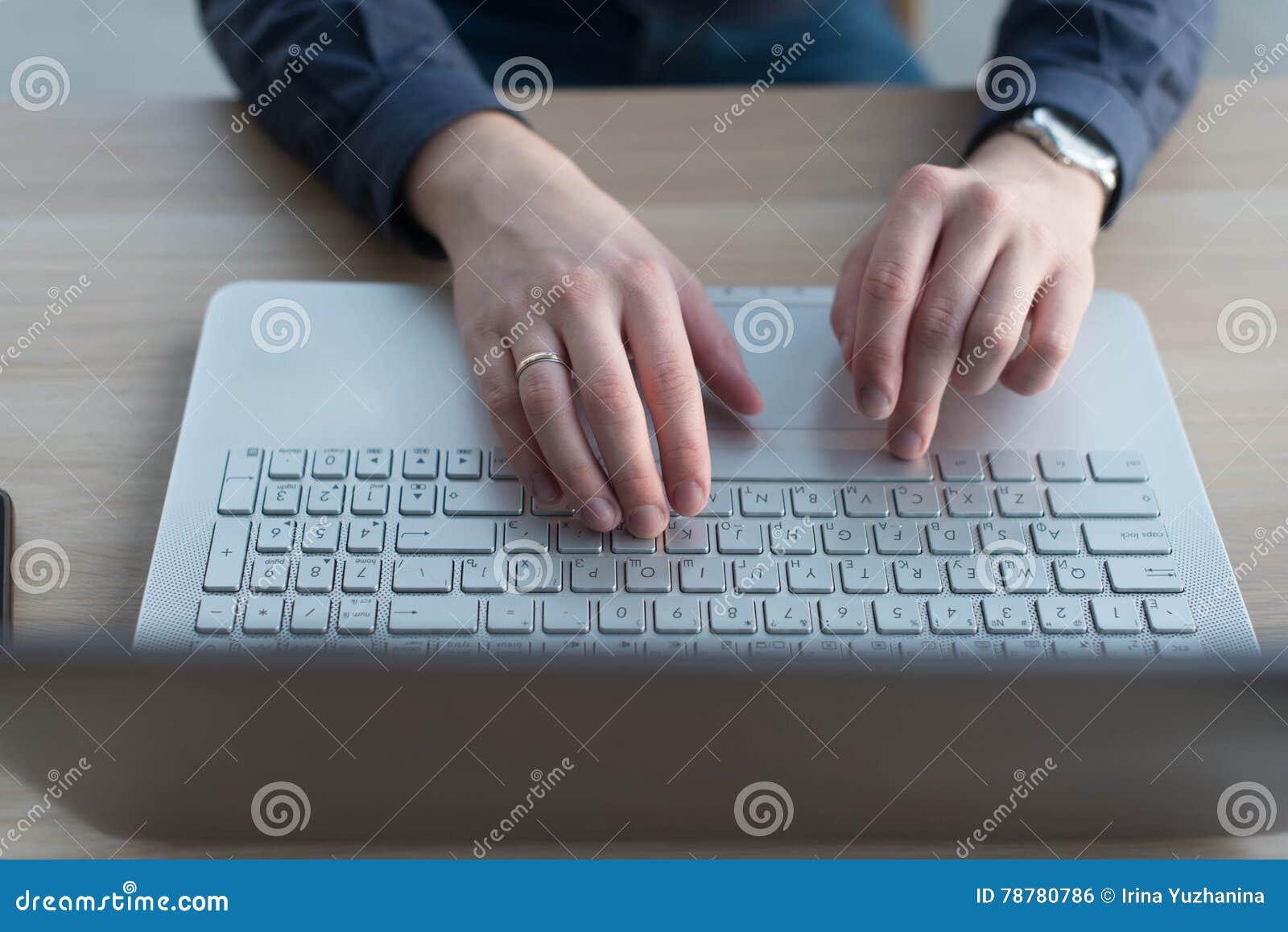 Hands Typing on a Laptop Keyboard. Man Working in the Workplace Stock ...