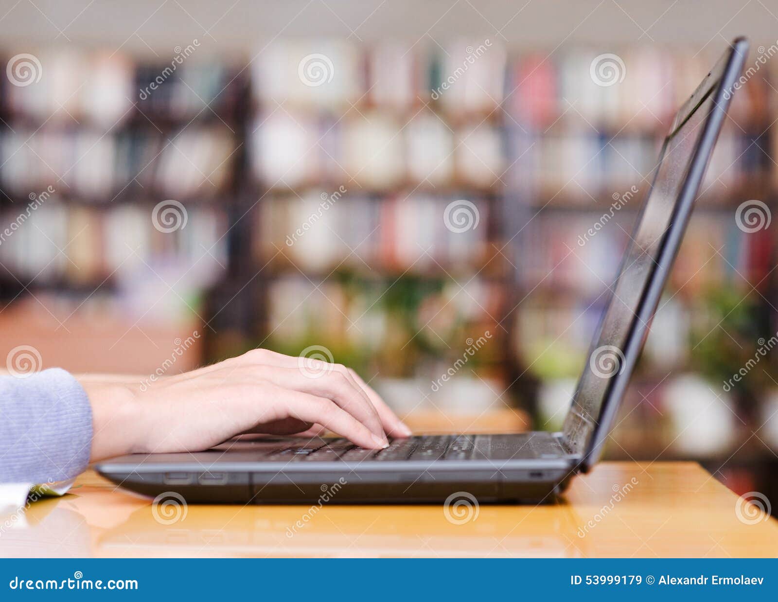 Hands Typing on Notebook in Library Stock Image - Image of internet ...