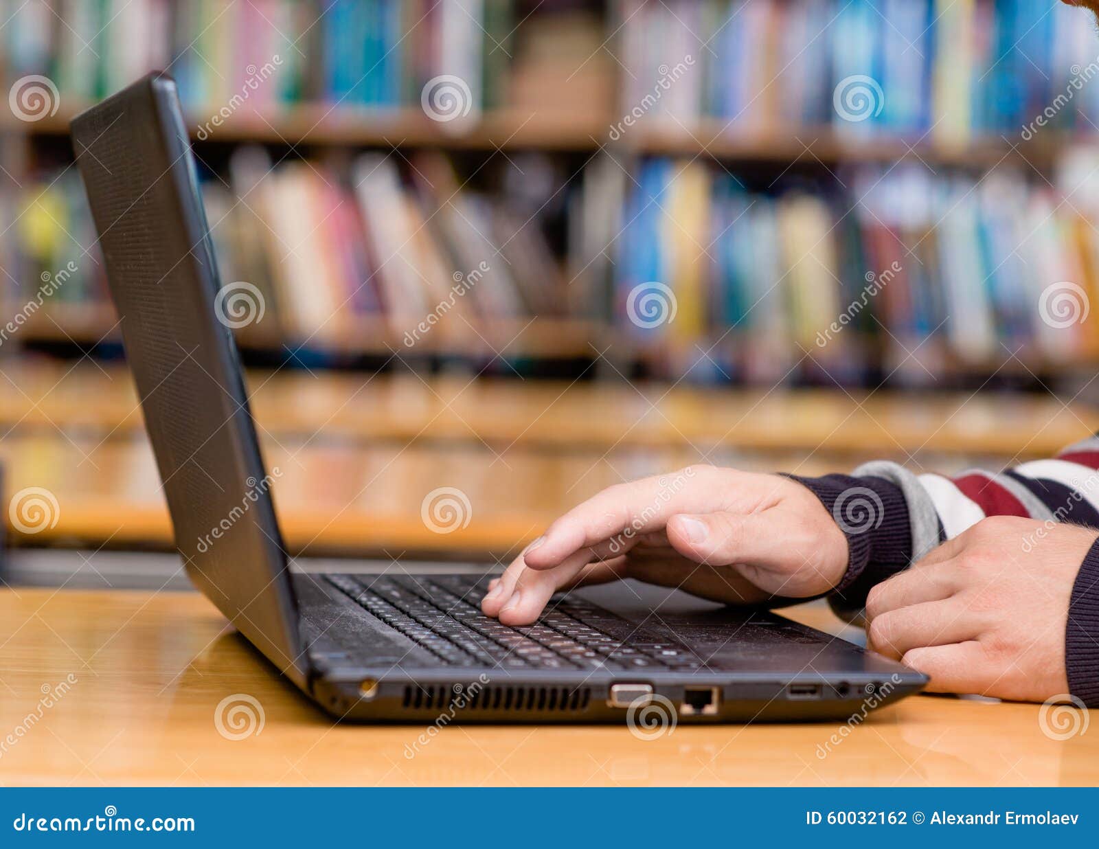 Hands Typing on Notebook in Library Stock Photo - Image of modern ...