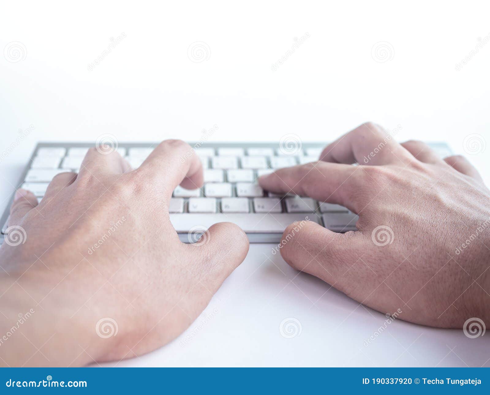 Hands Typing on Remote Control Wireless Computer Keyboard Stock Photo ...