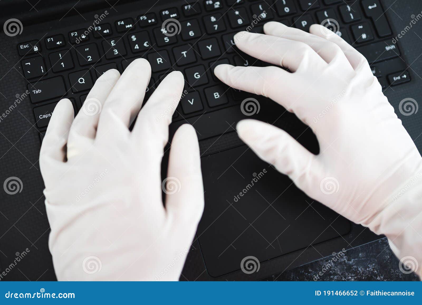 Hands Typing on Shared Computer Keyboard at Work Wearing Disposable ...