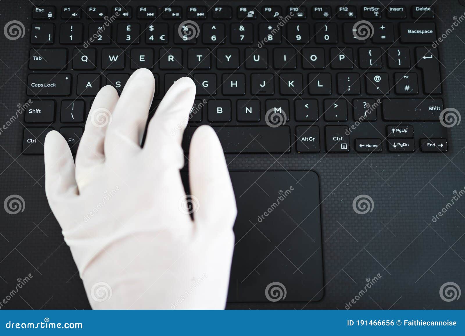 Hands Typing on Shared Computer Keyboard at Work Wearing Disposable ...