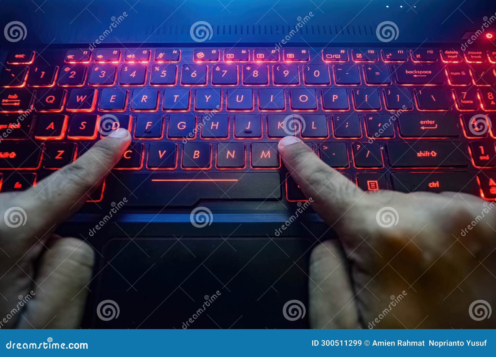 Hands Typing Using Both Index Fingers on a Gaming Laptop Keyboard ...