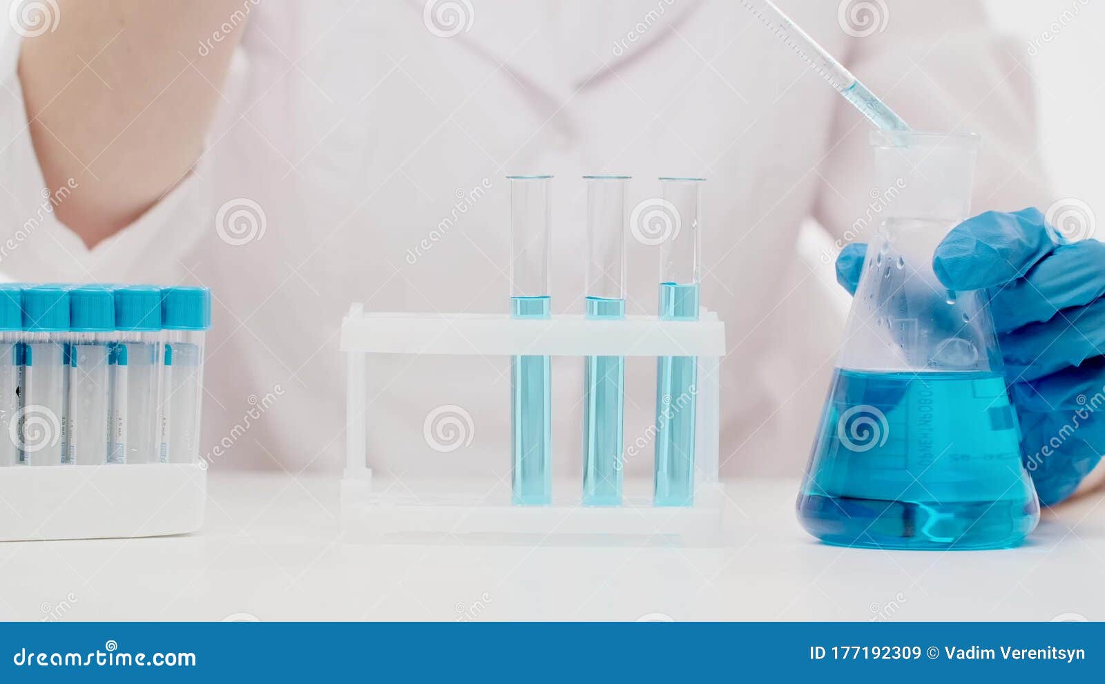 Hands of an Unidentified Female Lab Worker Pick Up Test Samples Stock ...