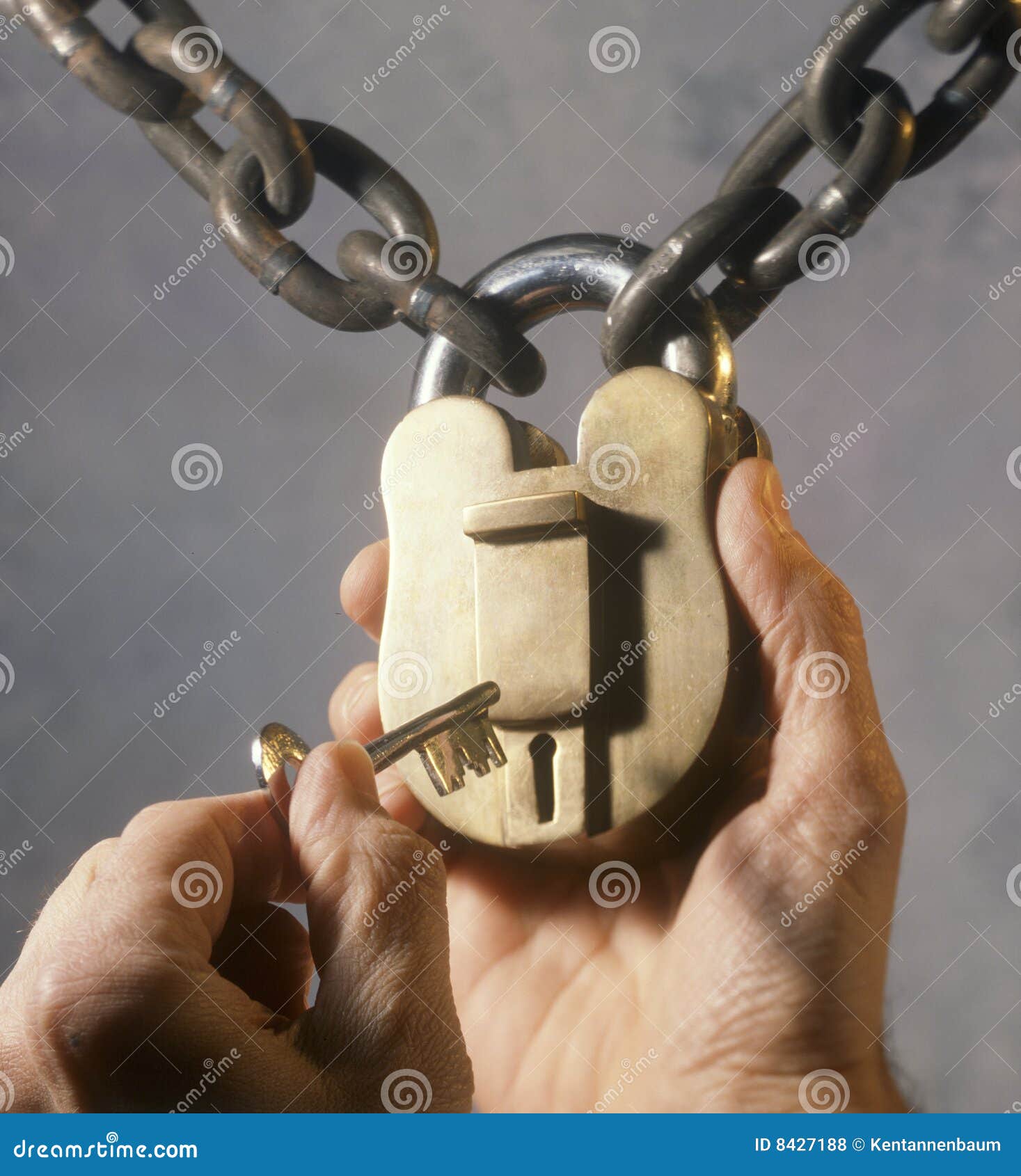 Hands Unlocking Old Brass Lock Stock Photo - Image of brass, unique ...