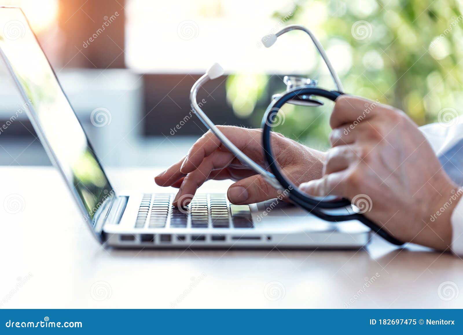 Hands of Unrecognizable Doctor Writing on a Computer Stock Image ...
