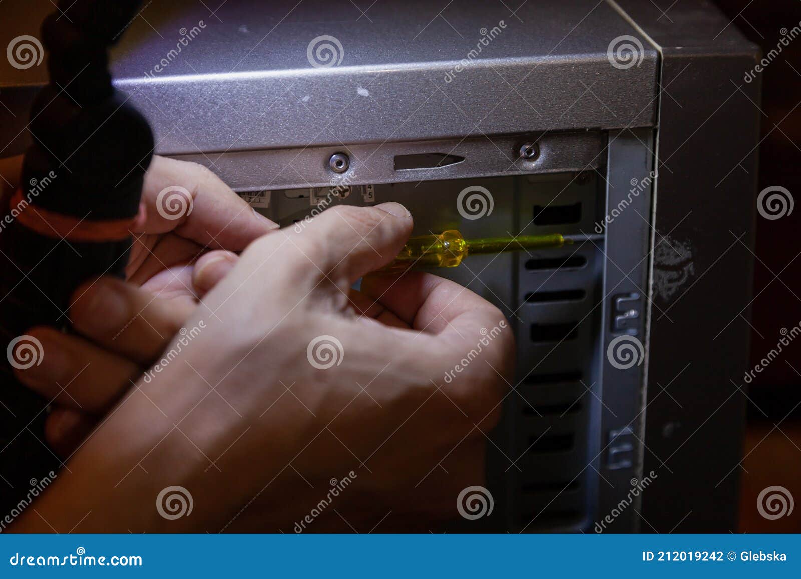 Hands Unscrew from Computer Case with Screwdriver Stock Photo - Image ...