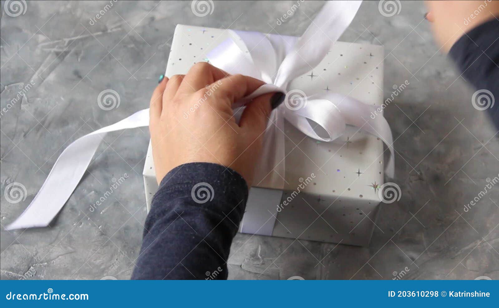 Hands Untie a Bow on a Present on a Table Stock Footage - Video of ...