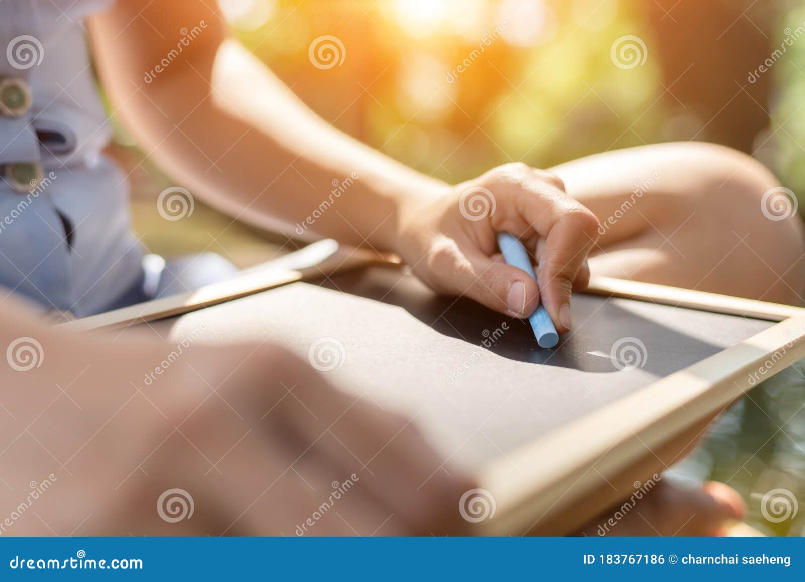 Hands Use Chalk for Drawing, Writing Balckboard in the Parks. Education ...