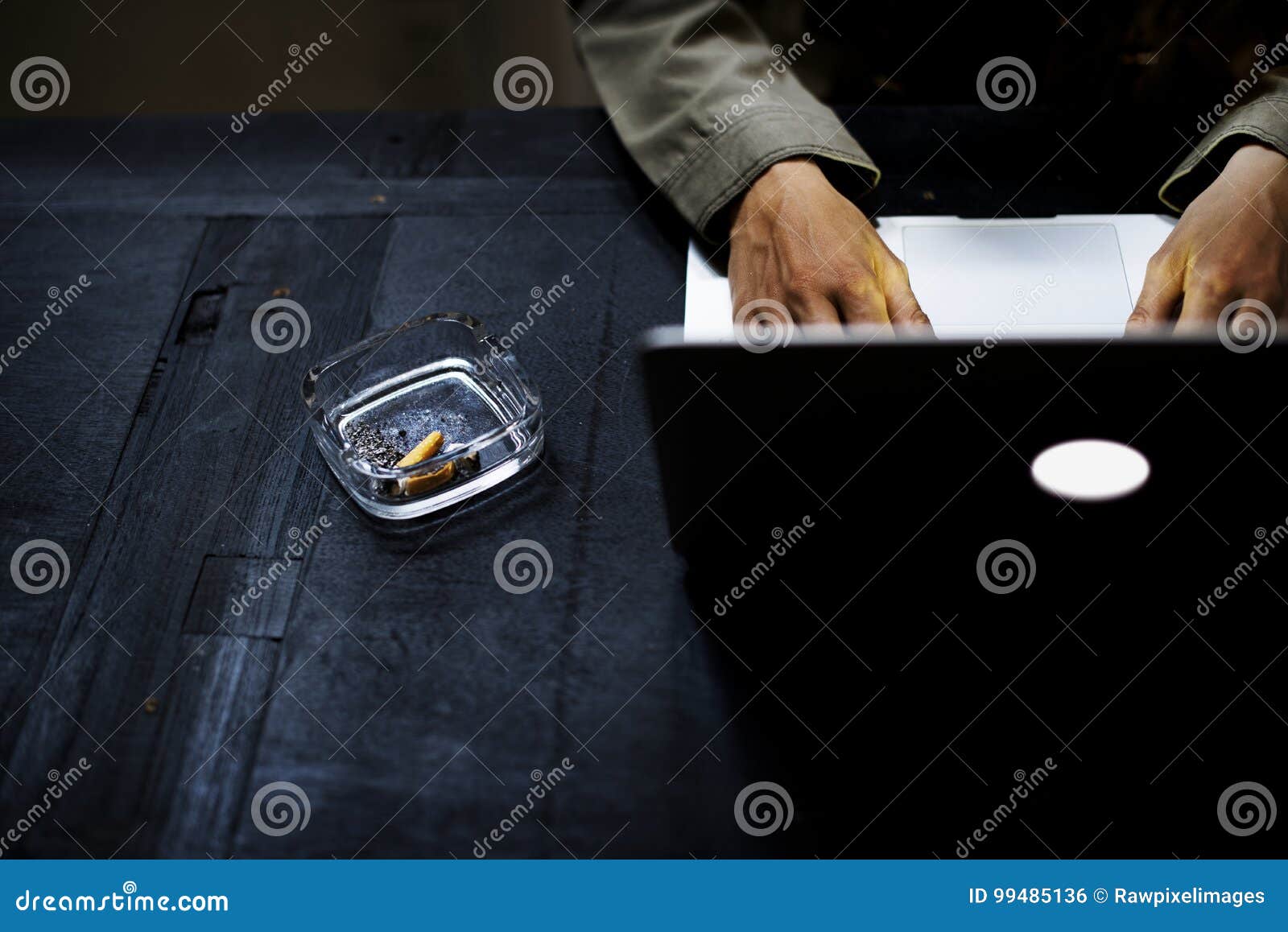 Hands Using Computer Laptop by the Cigarette Ash Tray Stock Photo ...