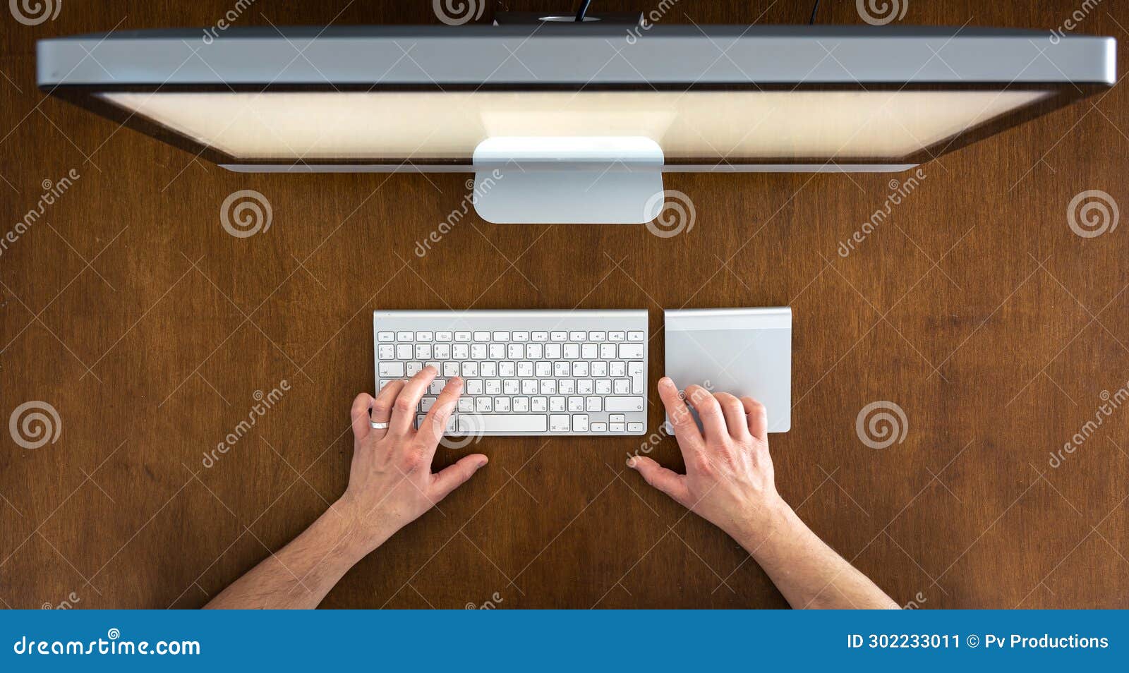 Hands Using a Computer while Sitting at the Table, Top View. Stock ...