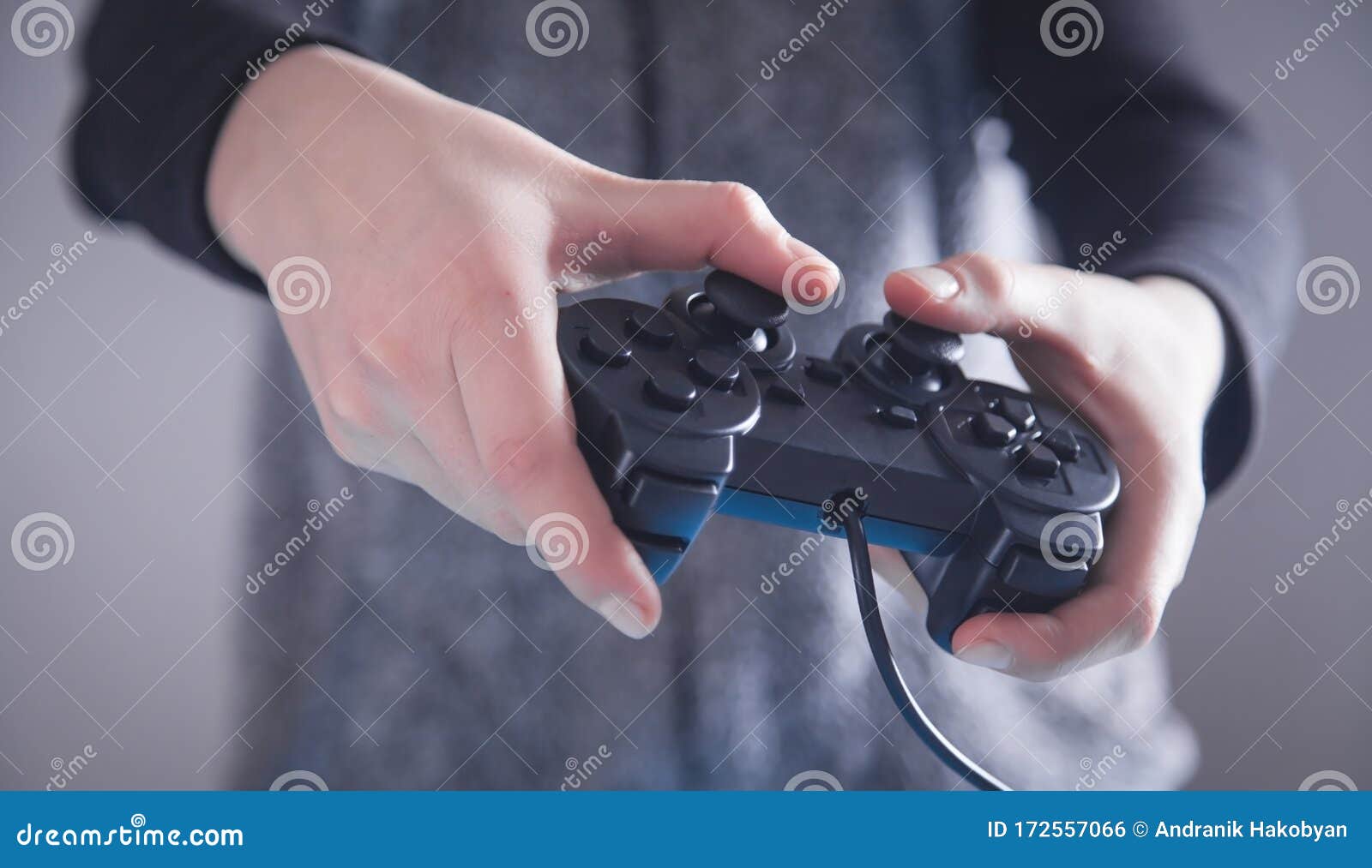 Hands Using Game Controller. Playing Video Games Stock Photo - Image of ...