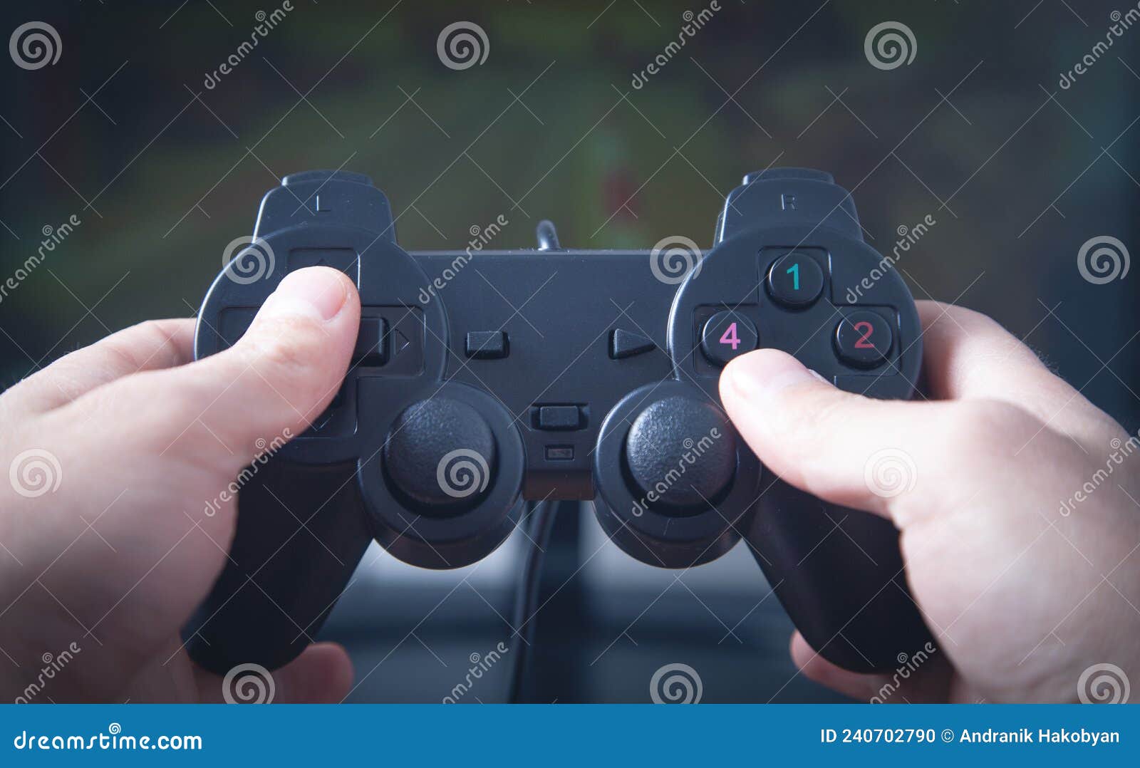 Hands Using Joystick. Playing Video Game on Computer Monitor Stock ...