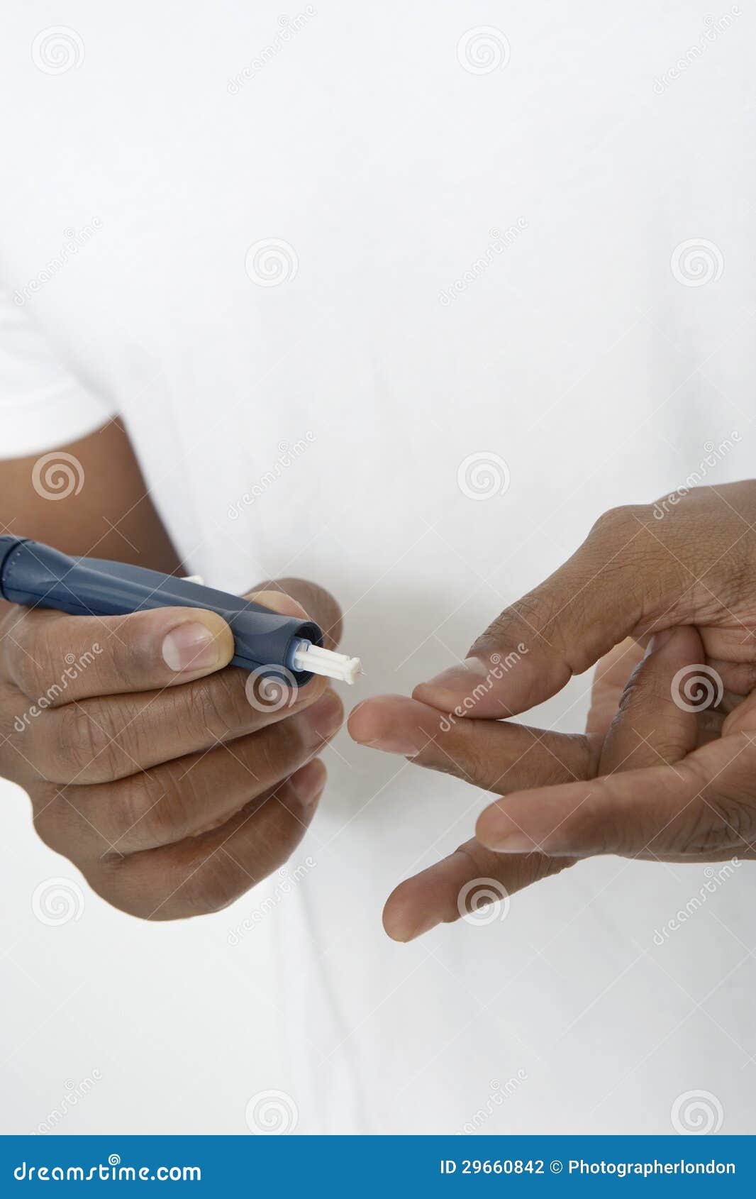 Hands Using Lancing Device stock photo. Image of american - 29660842