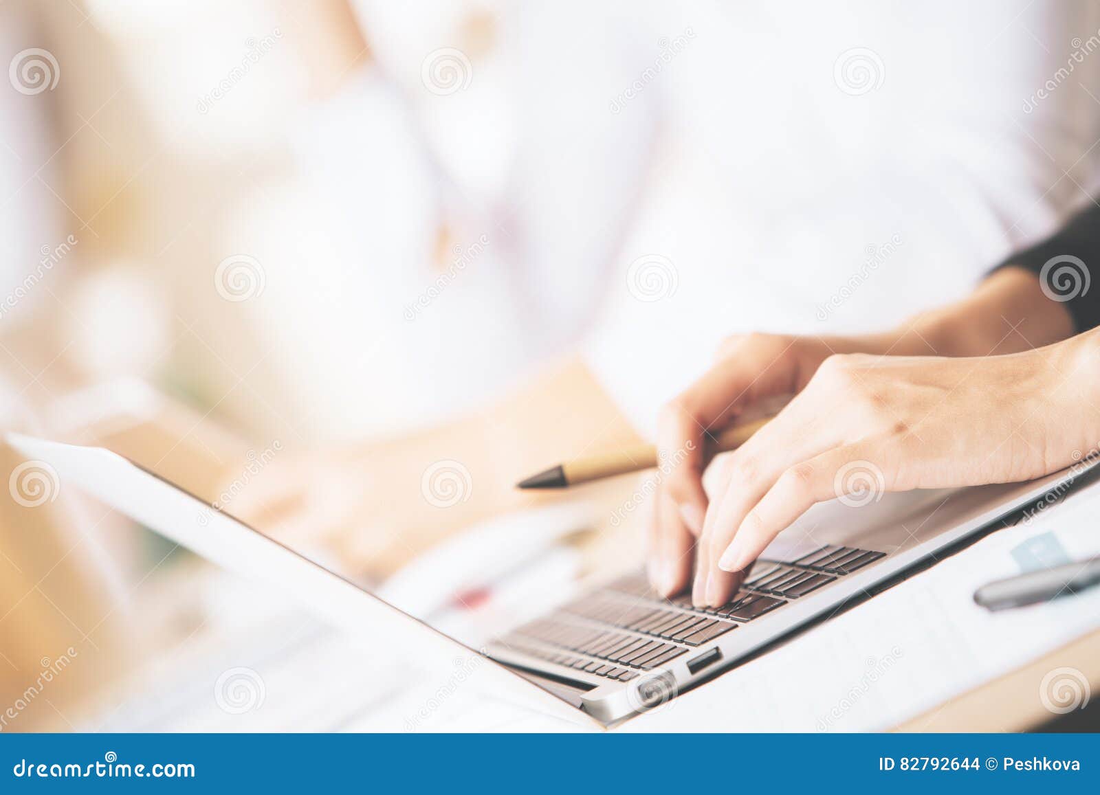 Hands using laptop side stock photo. Image of device - 82792644