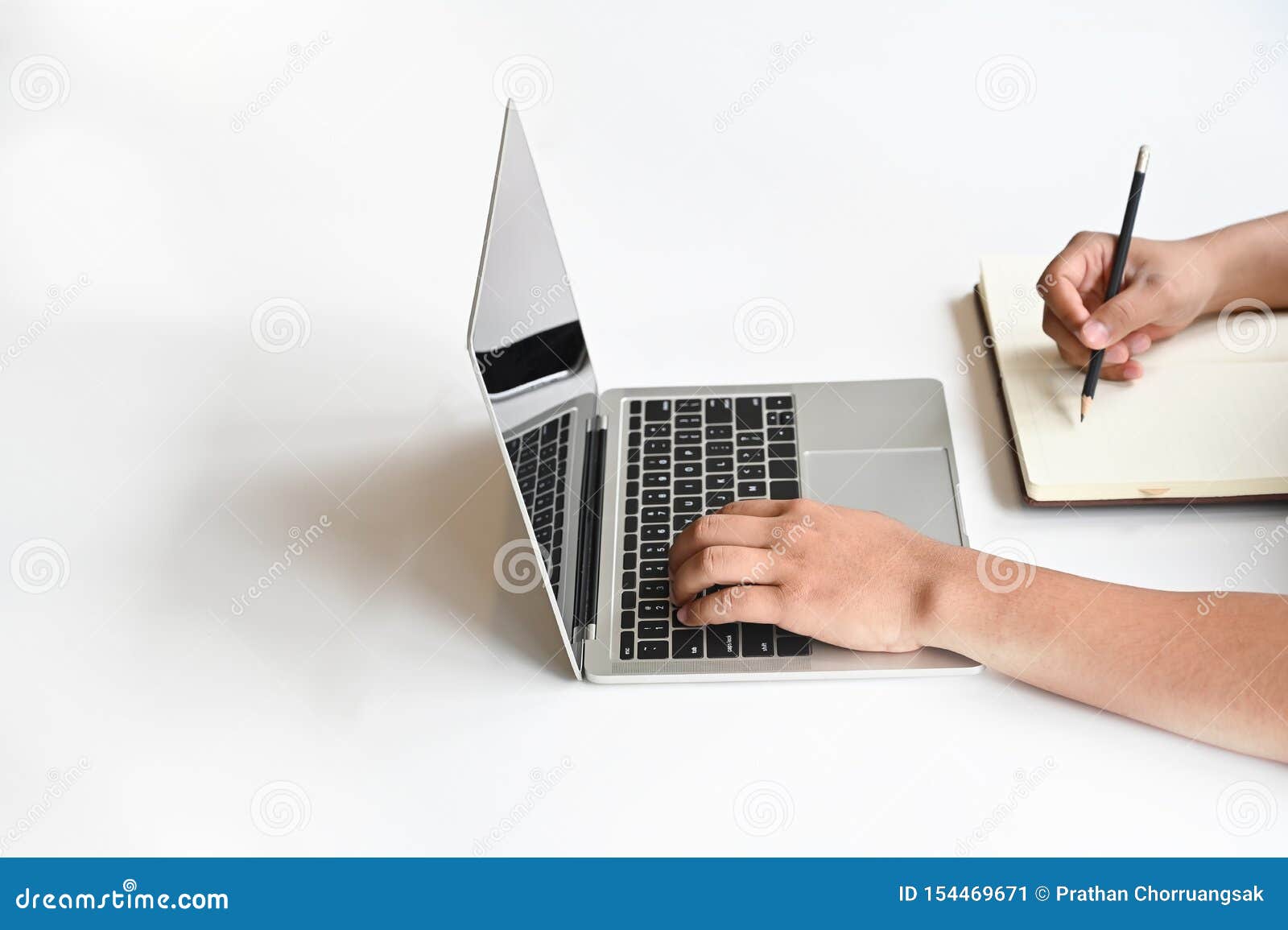 Hands Using Laptop and Writing Notebook Paper. Stock Image - Image of ...