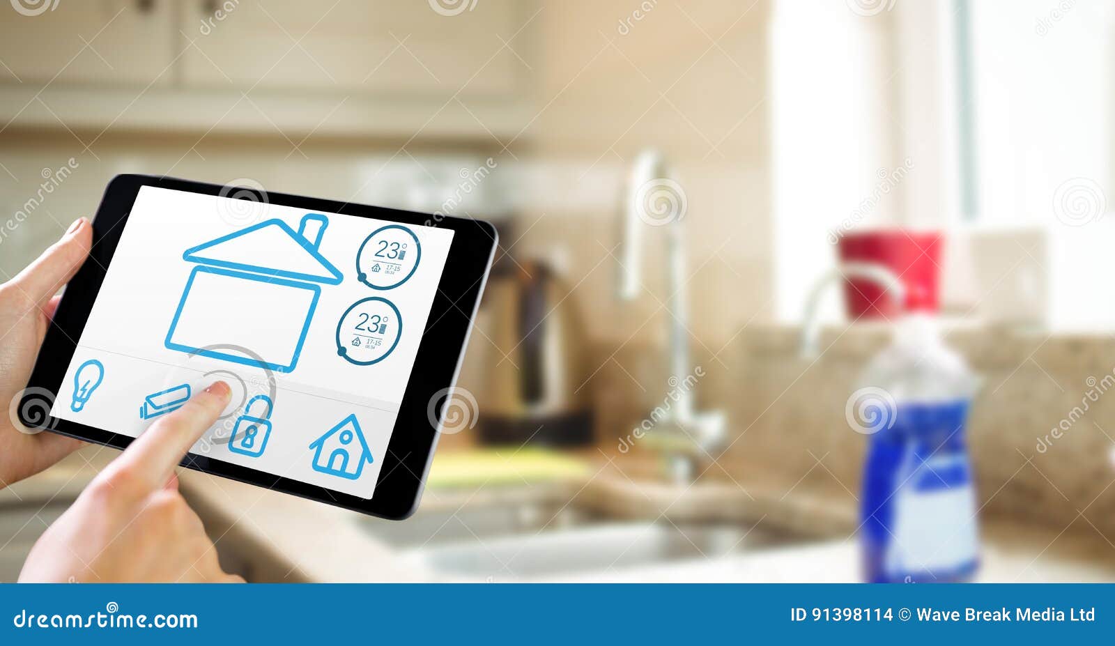 Hands Using Smart Home App on Tablet Computer in Kitchen Stock Photo ...