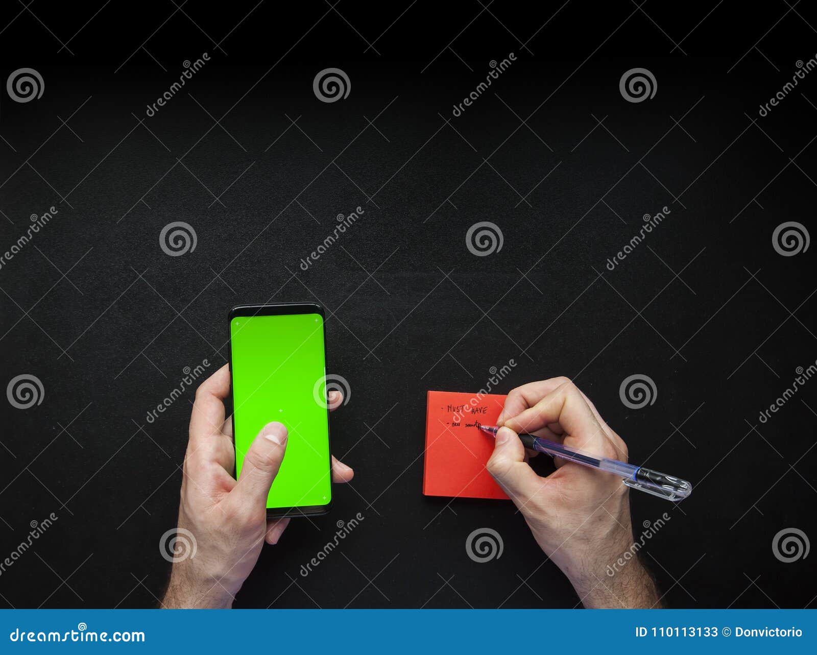 Hands Using Smart Phone and Noting Down on Sticky Notes Stock Image ...