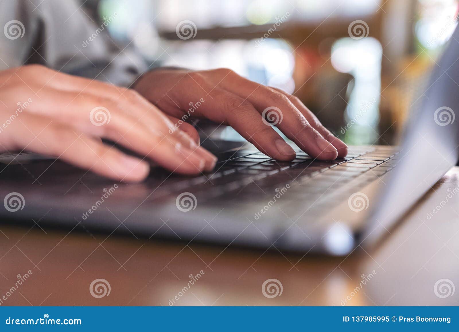 Hands Using and Typing on Laptop Keyboard on the Table Stock Image ...