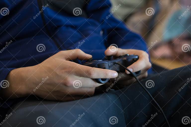 Hands Using Video Game Controller Stock Image - Image of wired ...