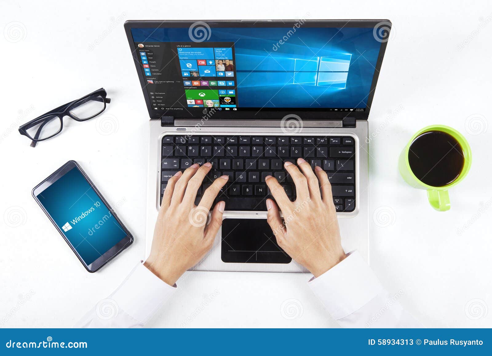 Hands Using Windows 10 on Laptop and Smartphone Editorial Stock Photo ...