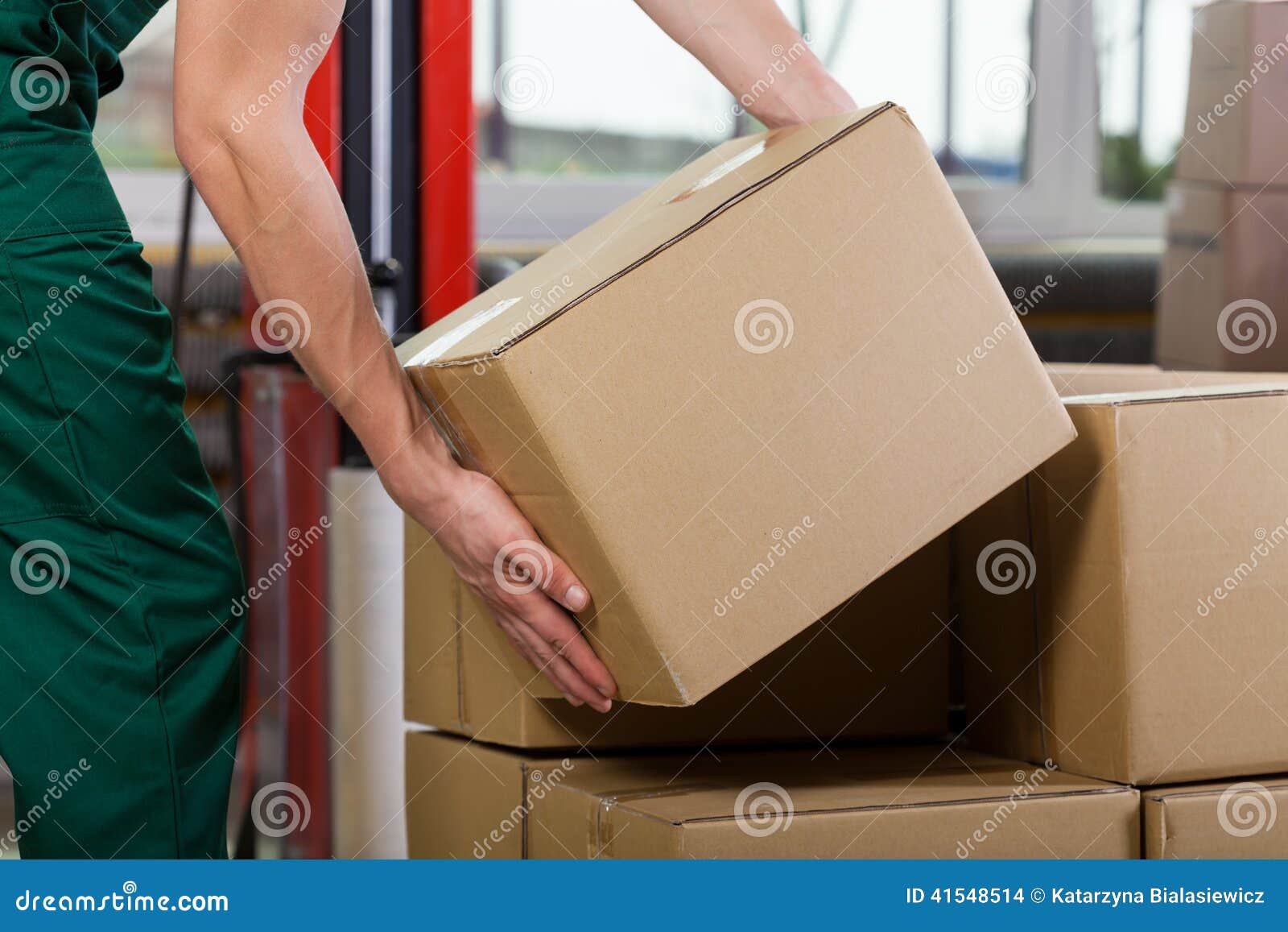 Hands of Warehouse Worker Lifting Box Stock Photo - Image of package ...