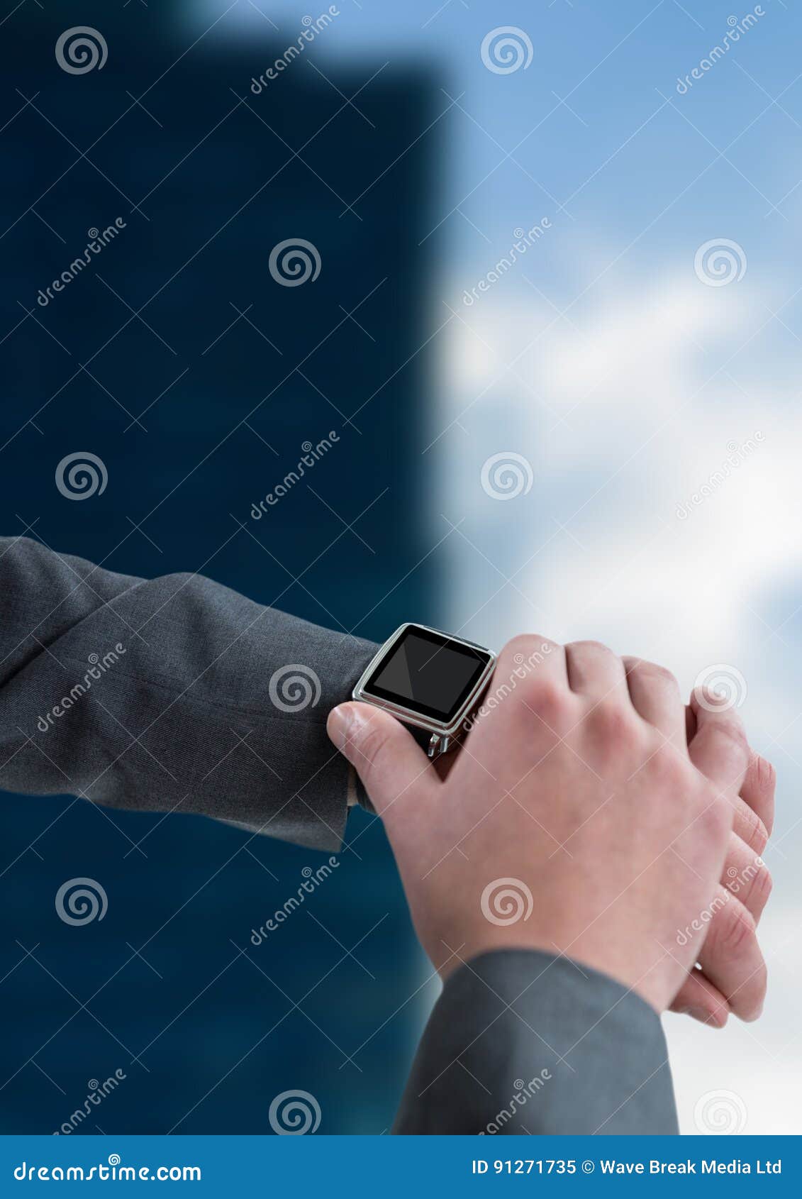 Hands with Watch Against Blurry Building Stock Image - Image of ...