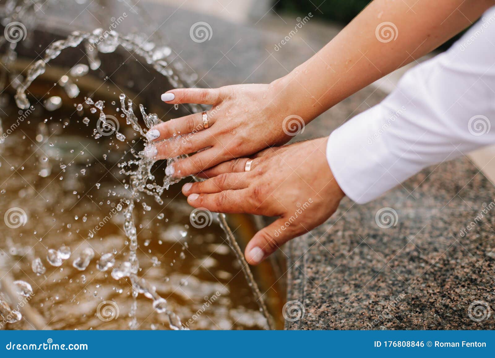 Hands with Water Splash, Backlit by the Evening Sun Stock Photo - Image ...