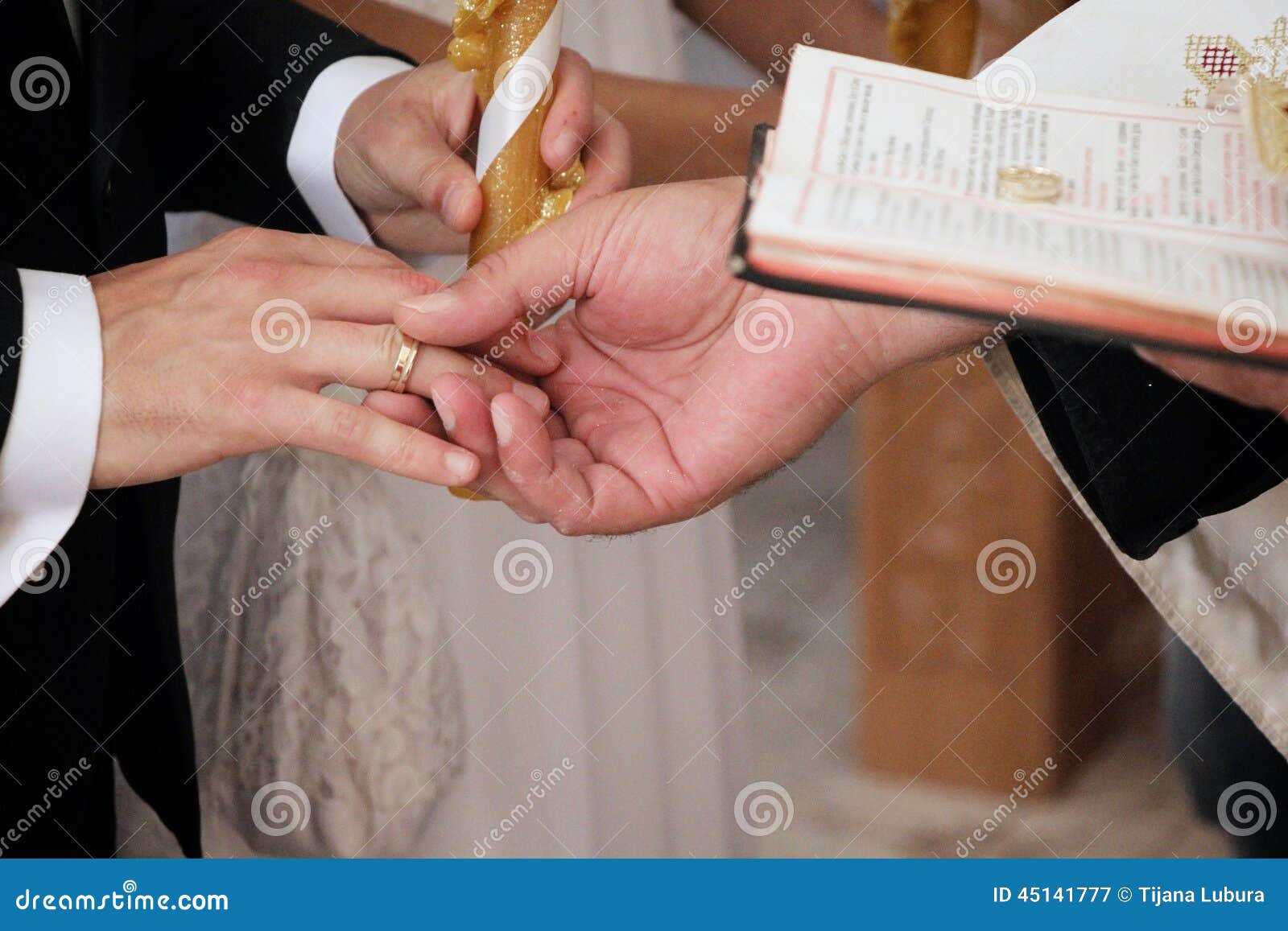 Hands and wedding rings stock image. Image of fingers - 45141777