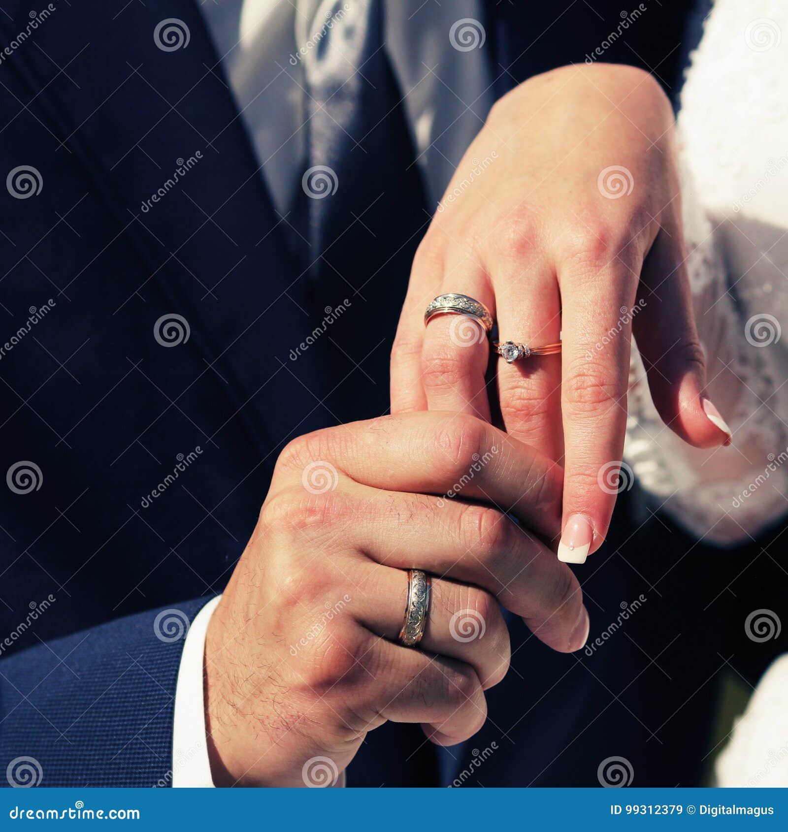 Hands with wedding rings stock image. Image of marriage - 99312379