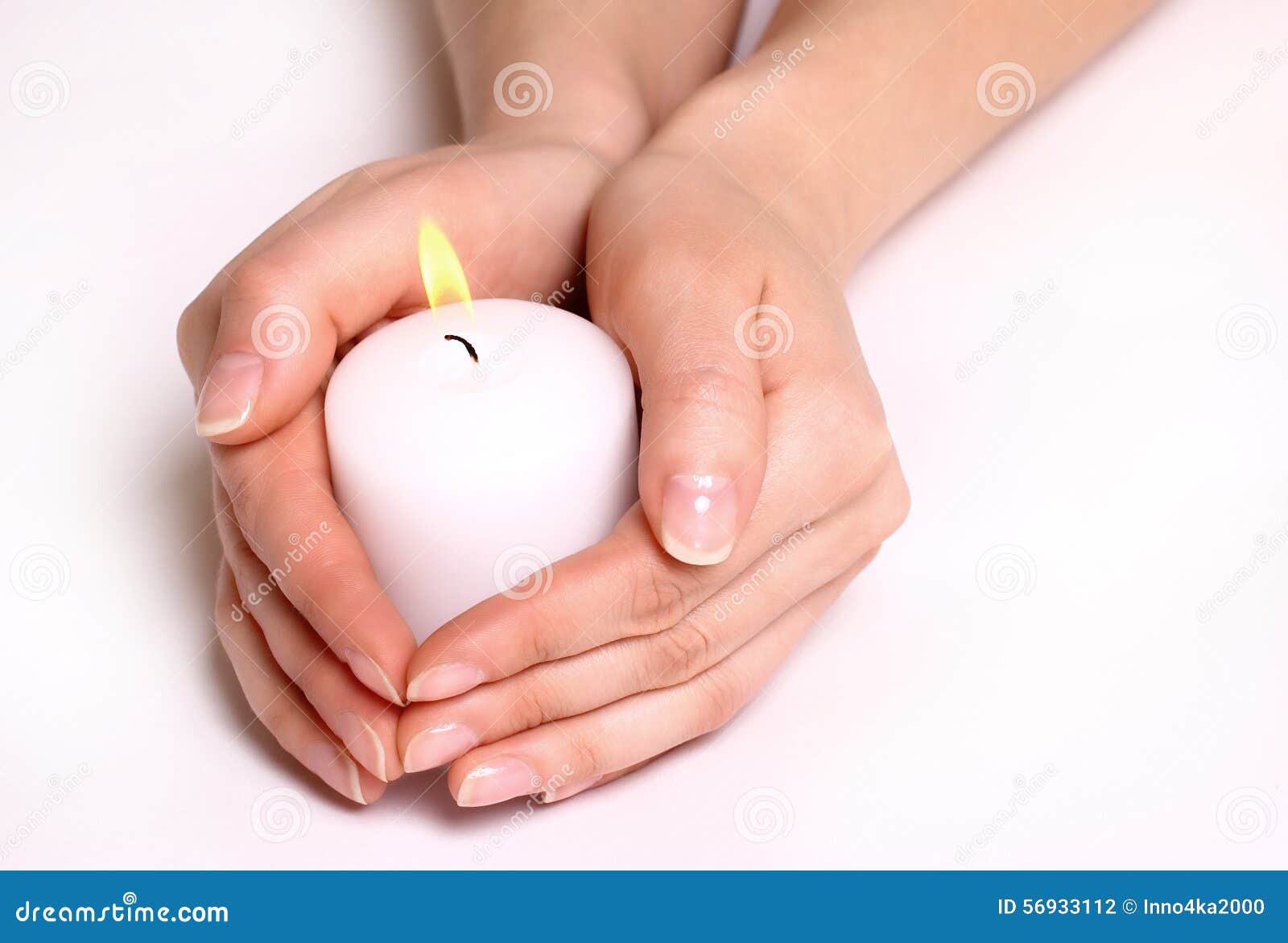 Hands and white candle stock photo. Image of romance - 56933112