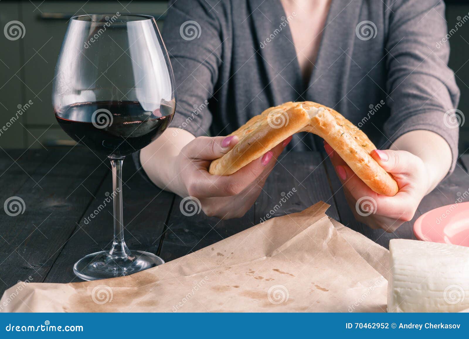 Hands of a Woman Breaking and Sharing Bread Stock Photo - Image of ...
