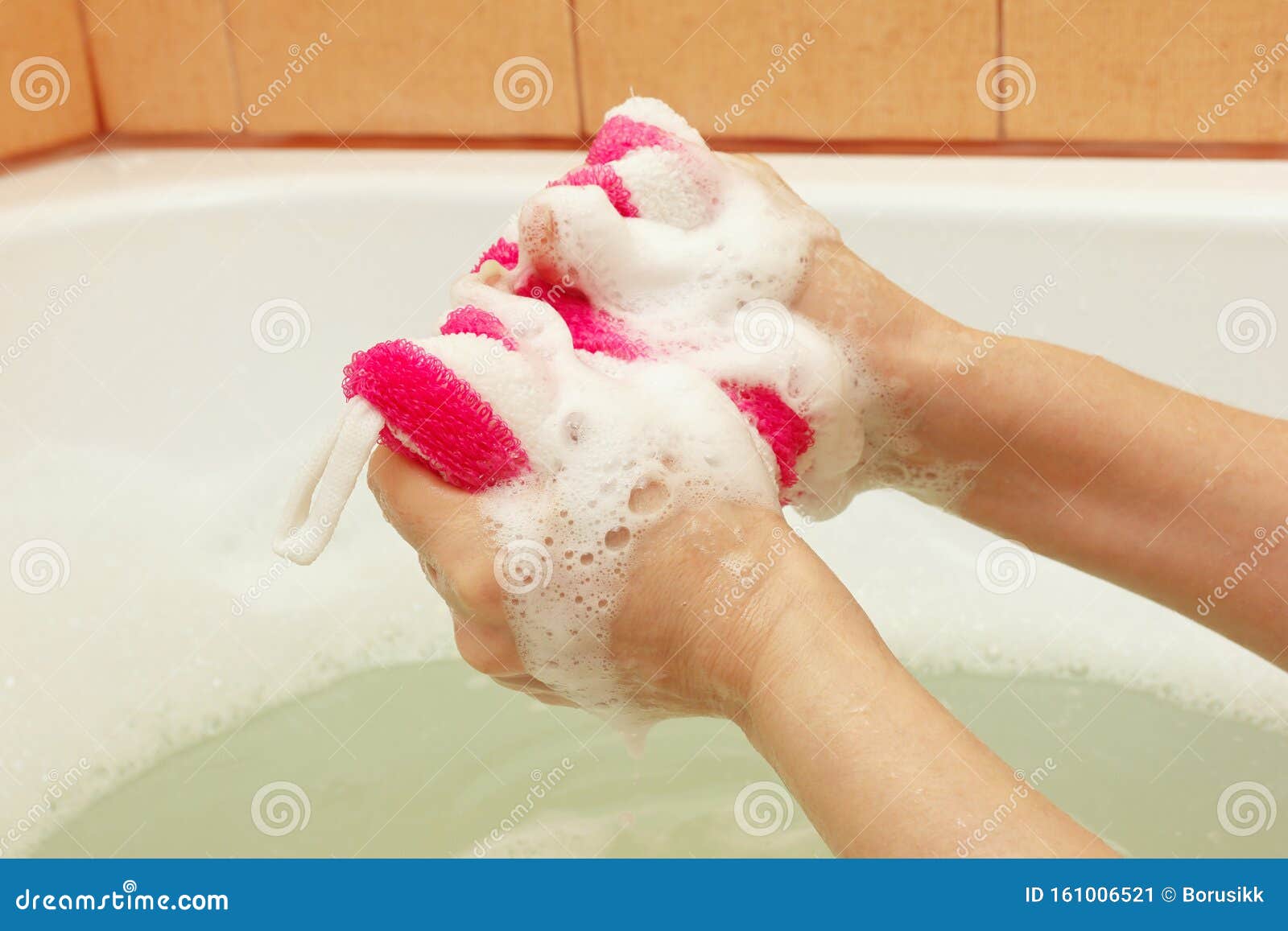 Hands of Woman Lathering Striped Sponge with Soap Stock Image - Image ...