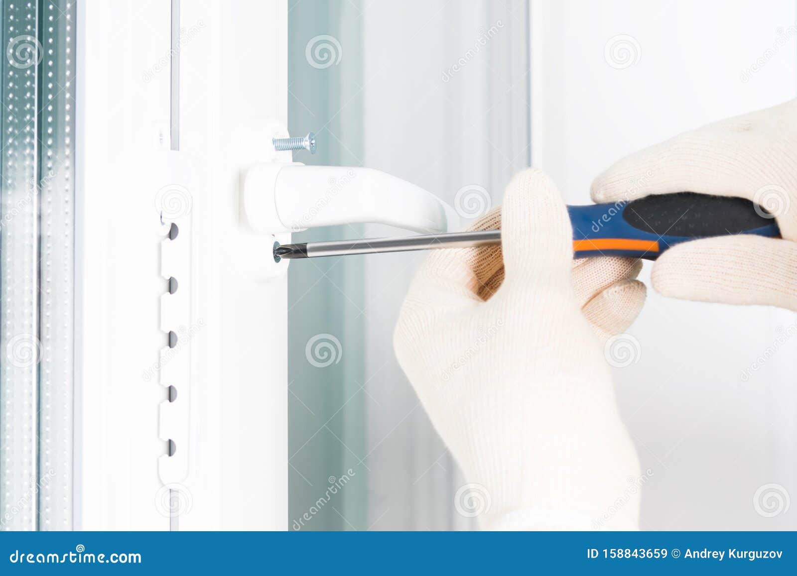 The Hands of a Worker Fasten the Handle To a Plastic Window, Closeup ...
