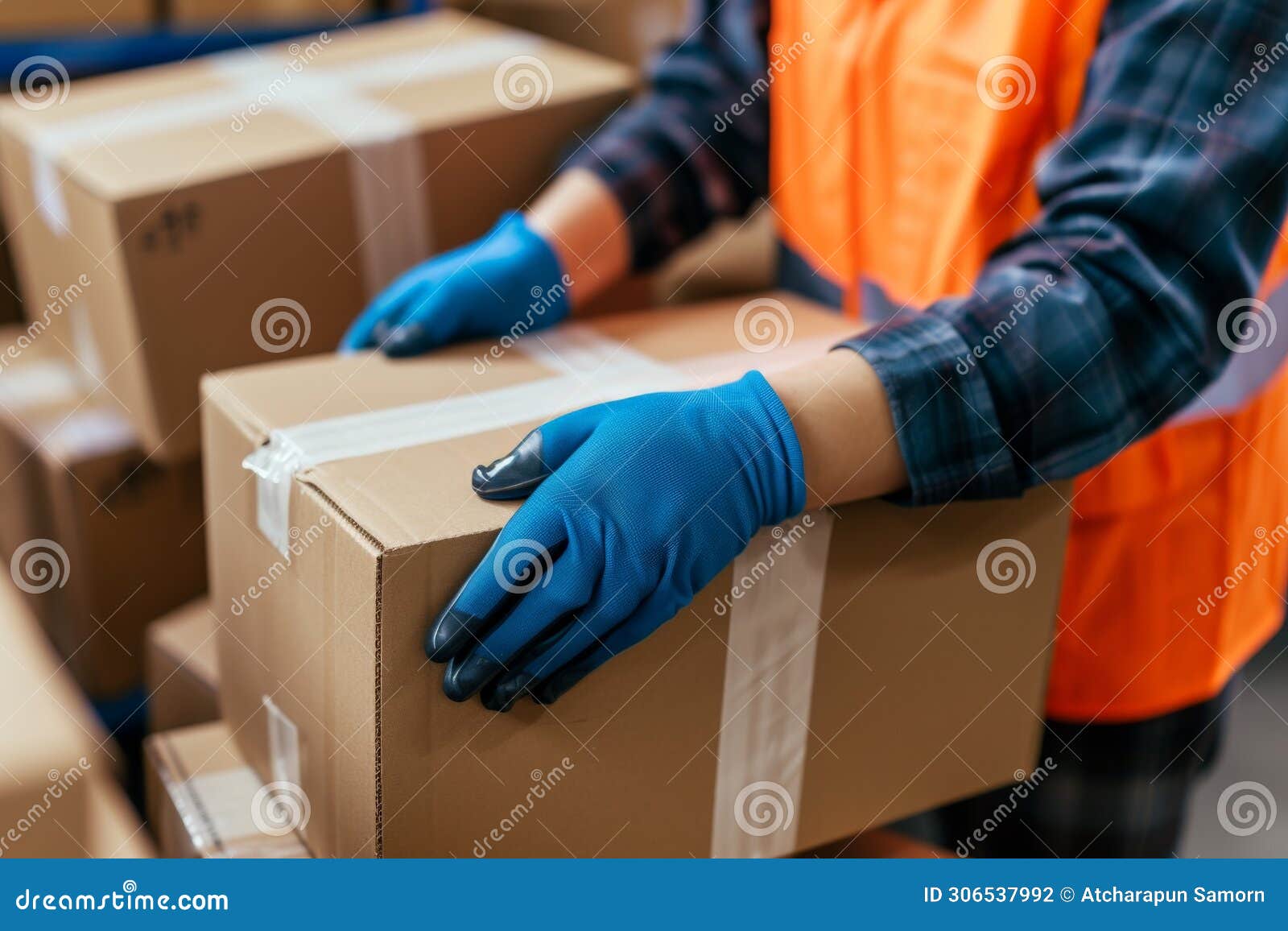 Hands of a Worker Moving Cardboard Boxes in a Warehouse, Packing Boxes ...