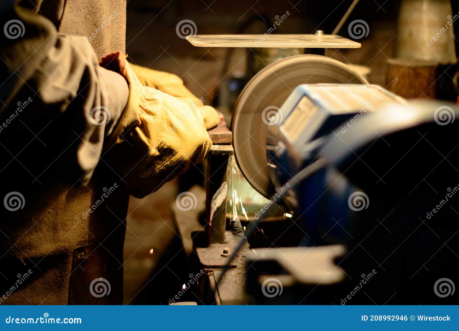 Hands of a Worker Wearing Gloves and Welding in the Factory Stock Photo ...