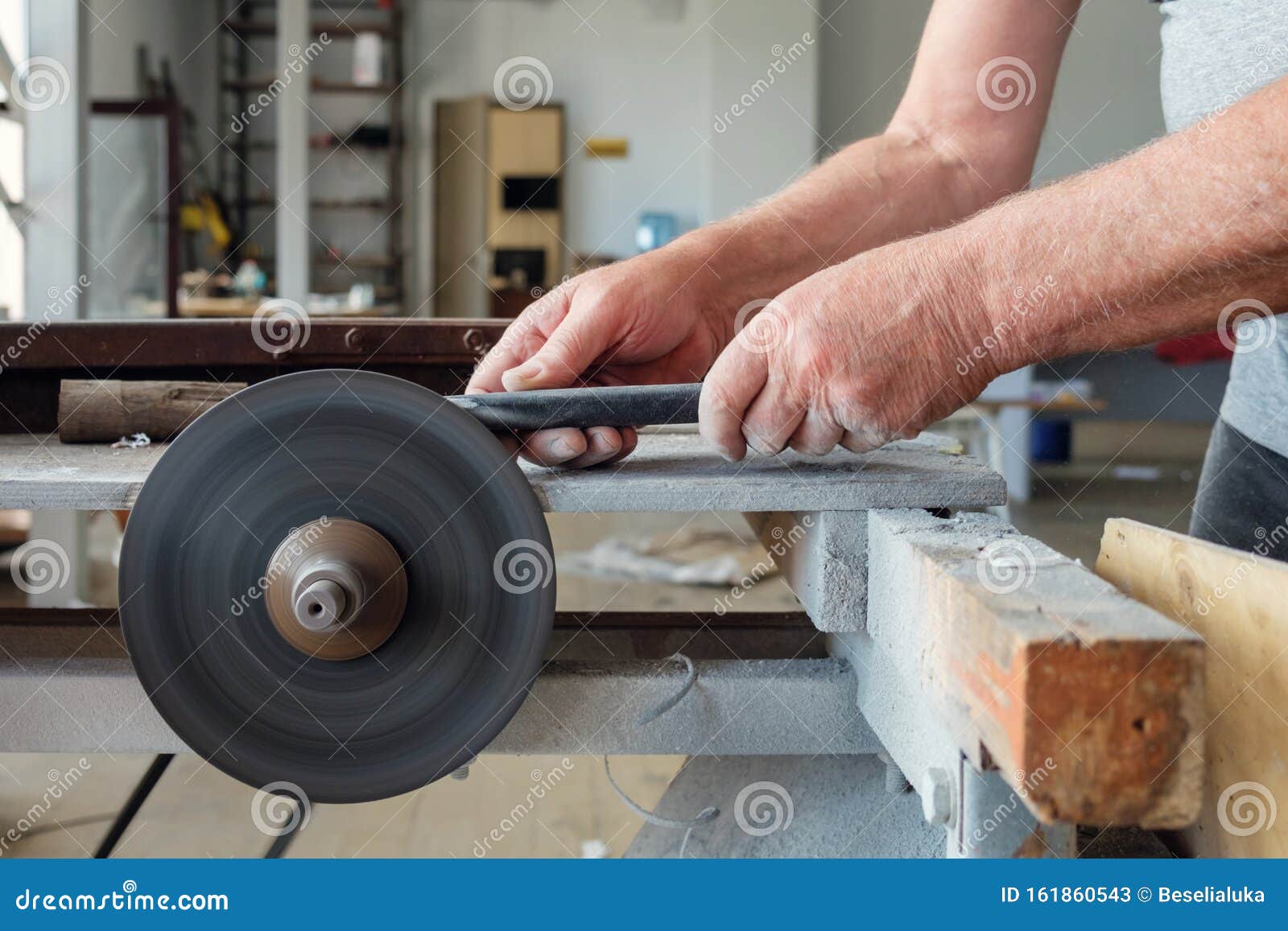 Hands of Worker Wich is Sharpering Knife on Grindstone Stock Image ...