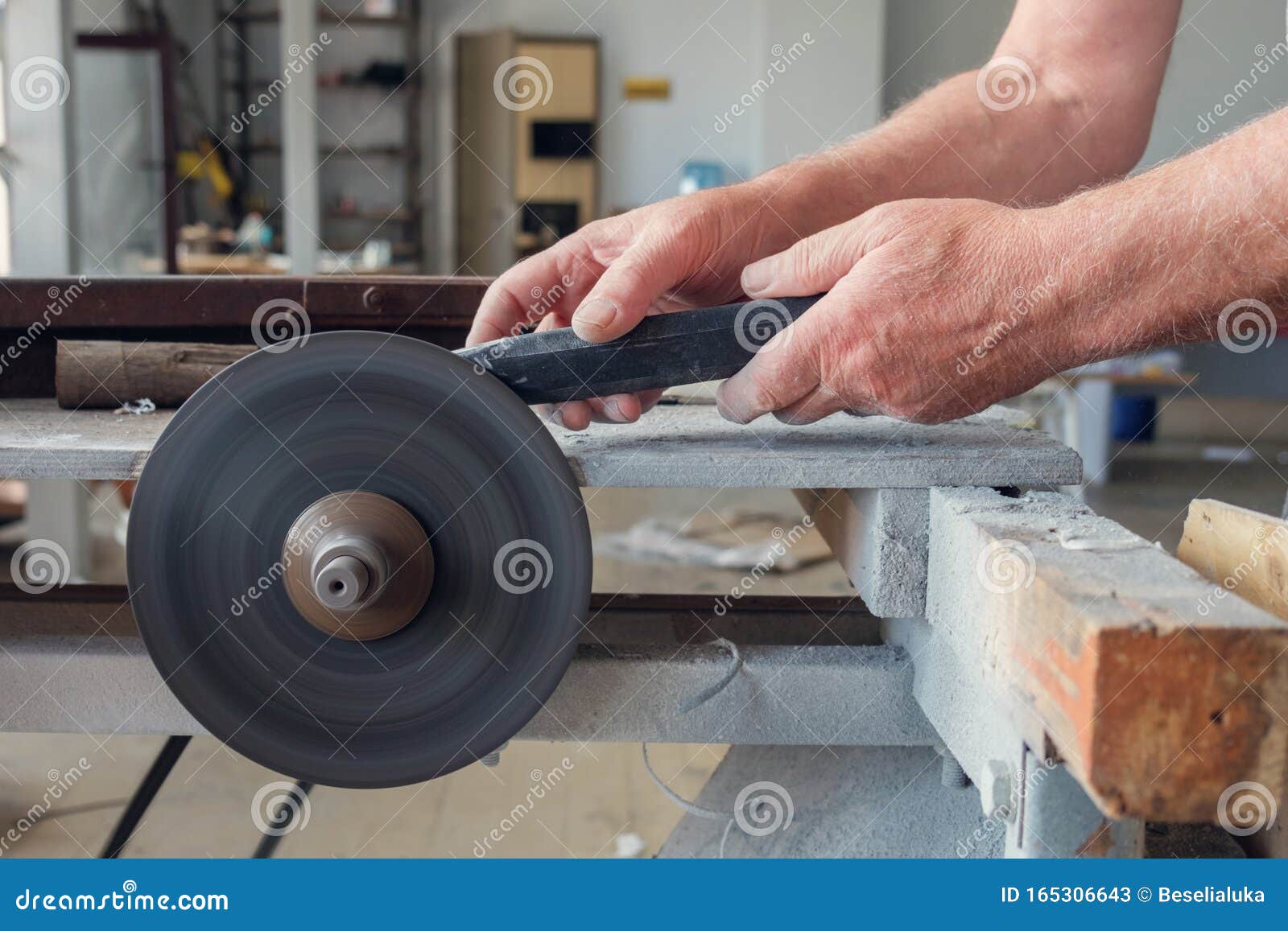Hands of Worker Wich is Sharpering Knife on Grindstone Stock Image ...