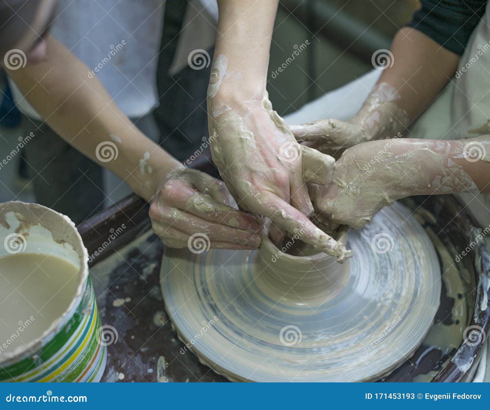 Hands working with clay stock image. Image of handicraft - 171453193