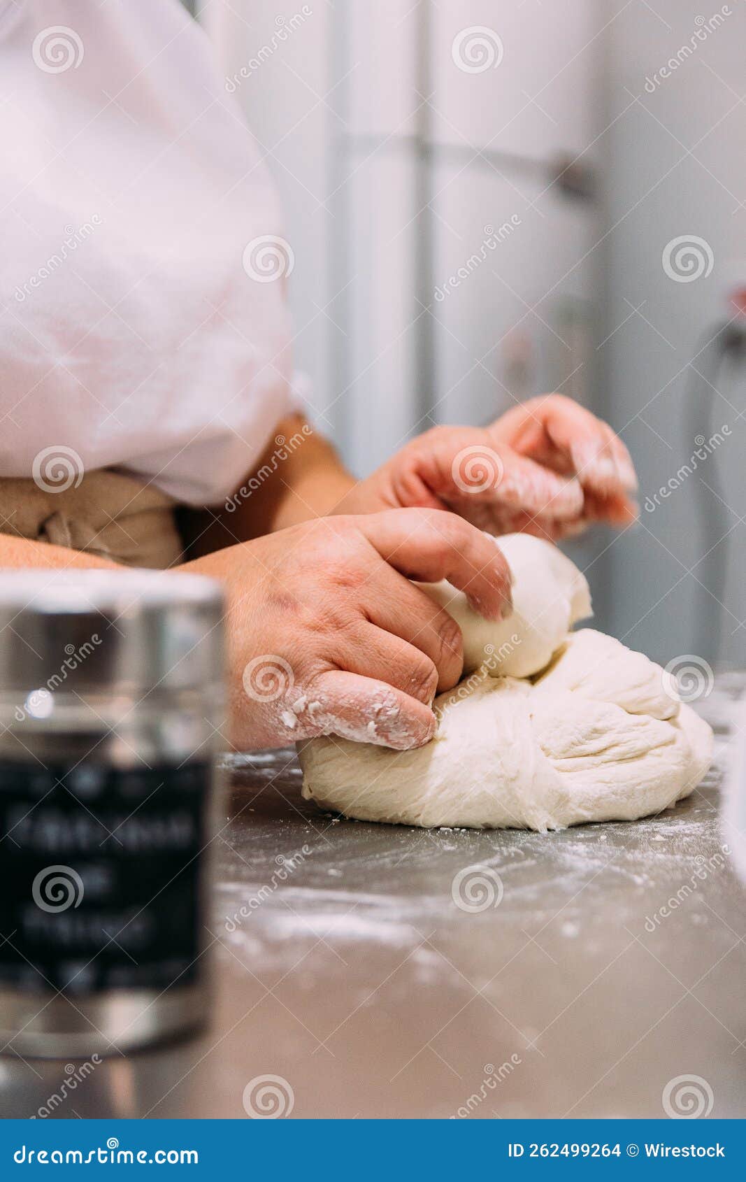 Hands working in bake shop stock photo. Image of levain - 262499264