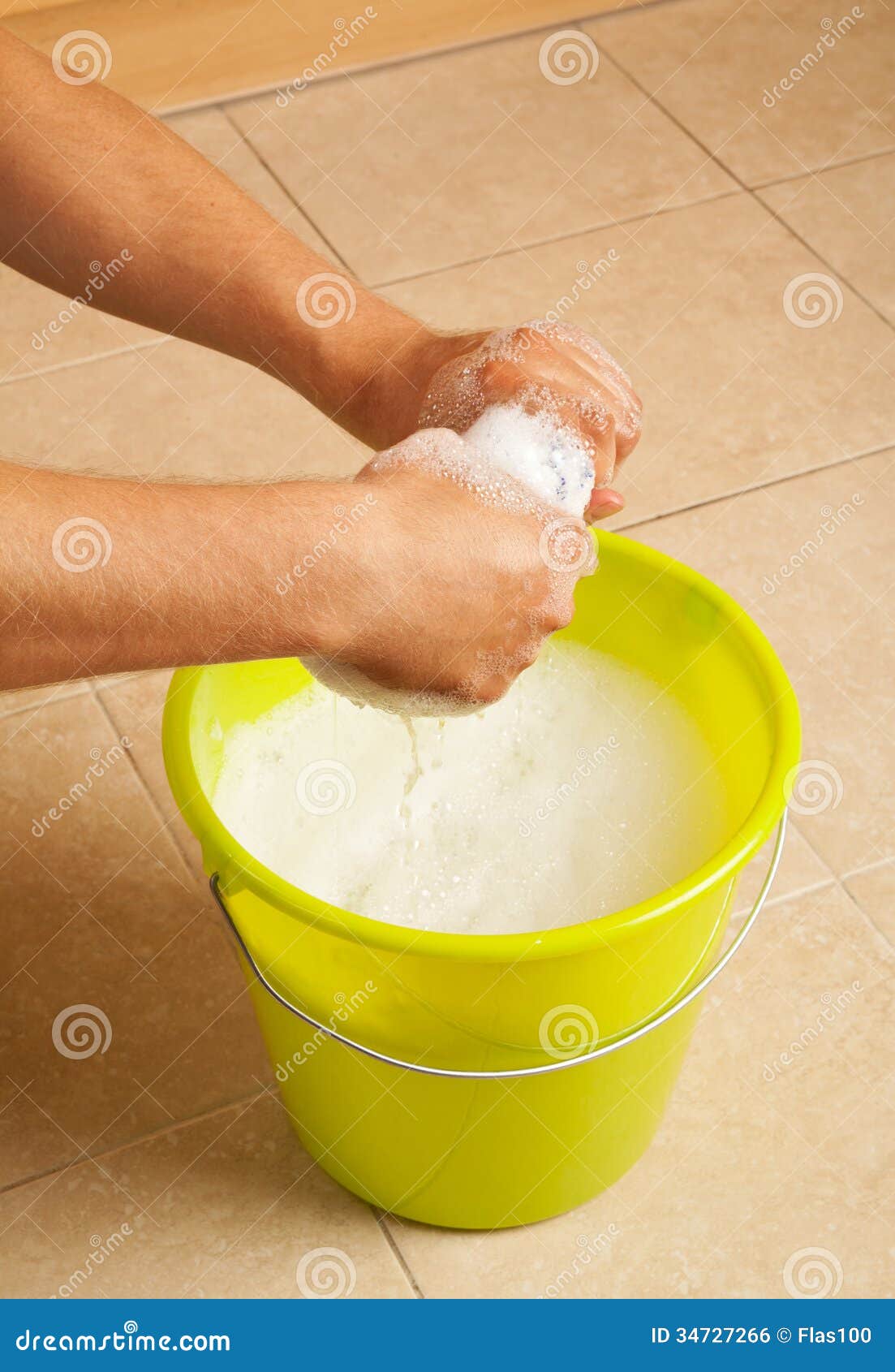 Hands Wringing the Water Out of a Cloth Stock Photo - Image of floor ...