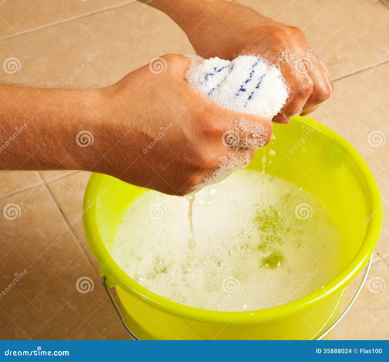 Hands wringing the water stock photo. Image of floor - 35888024