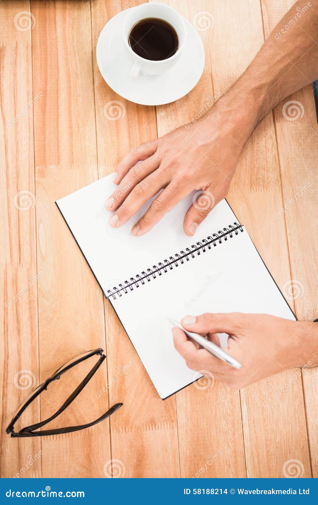 Hands writing on notepad stock photo. Image of writing - 58188214