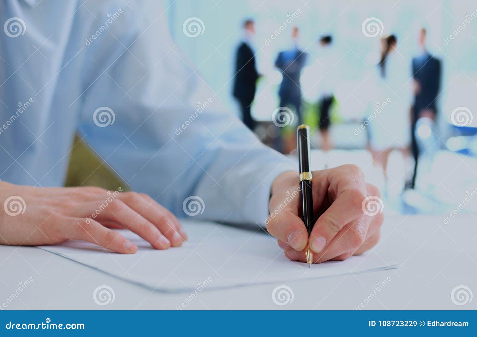 Hands writing on a paper . stock image. Image of financial - 108723229