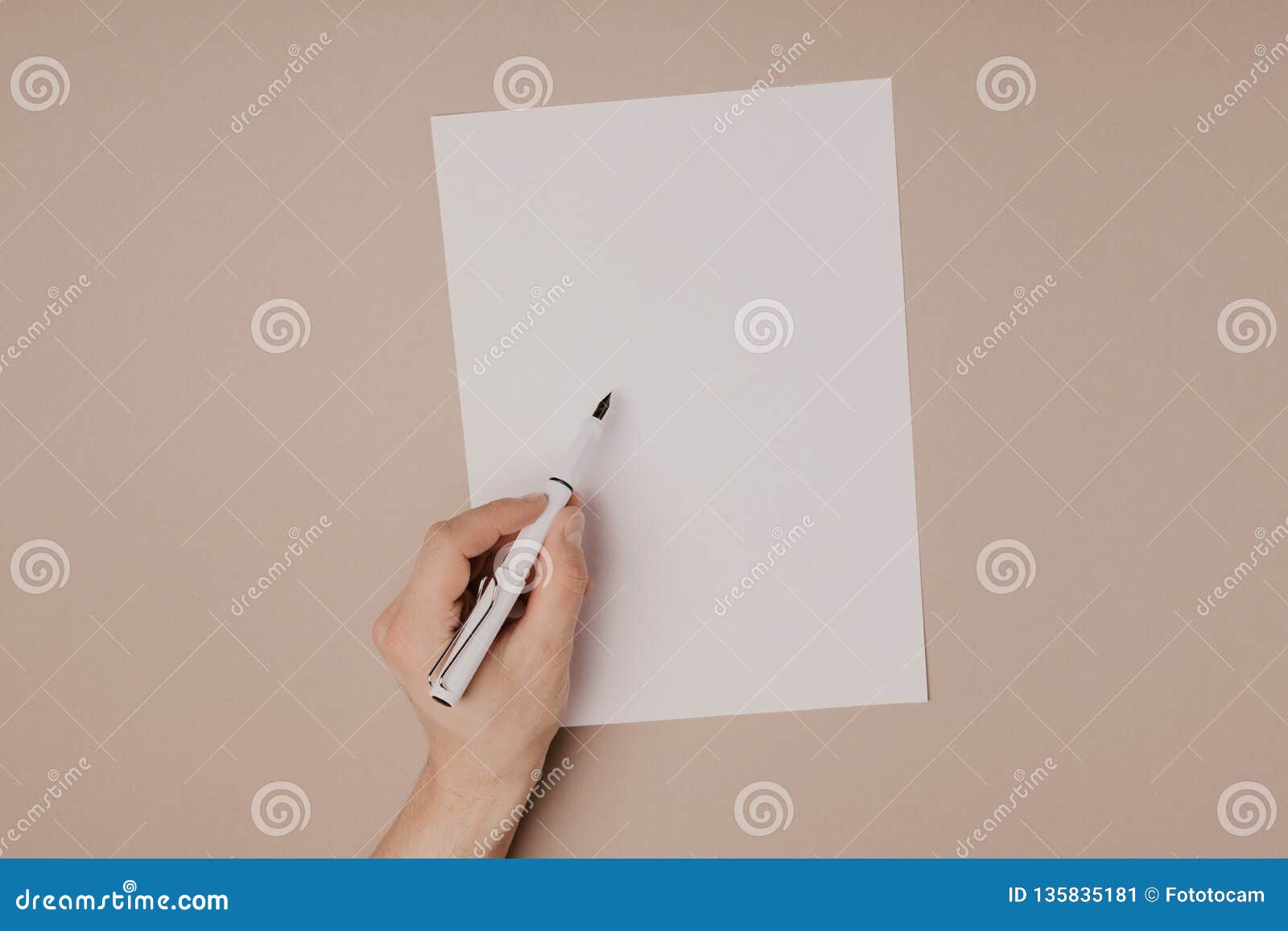 Hands Writing on Paper Blank A4 Size on Grey Background Stock Image ...